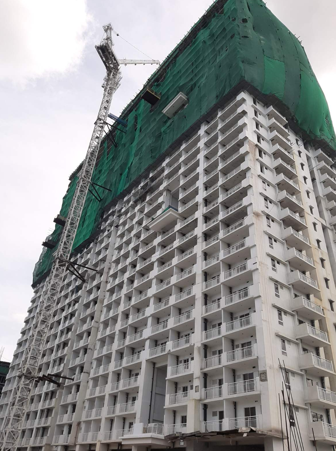 DMCI Homes’ QC project resumes construction, first tower approaches ...
